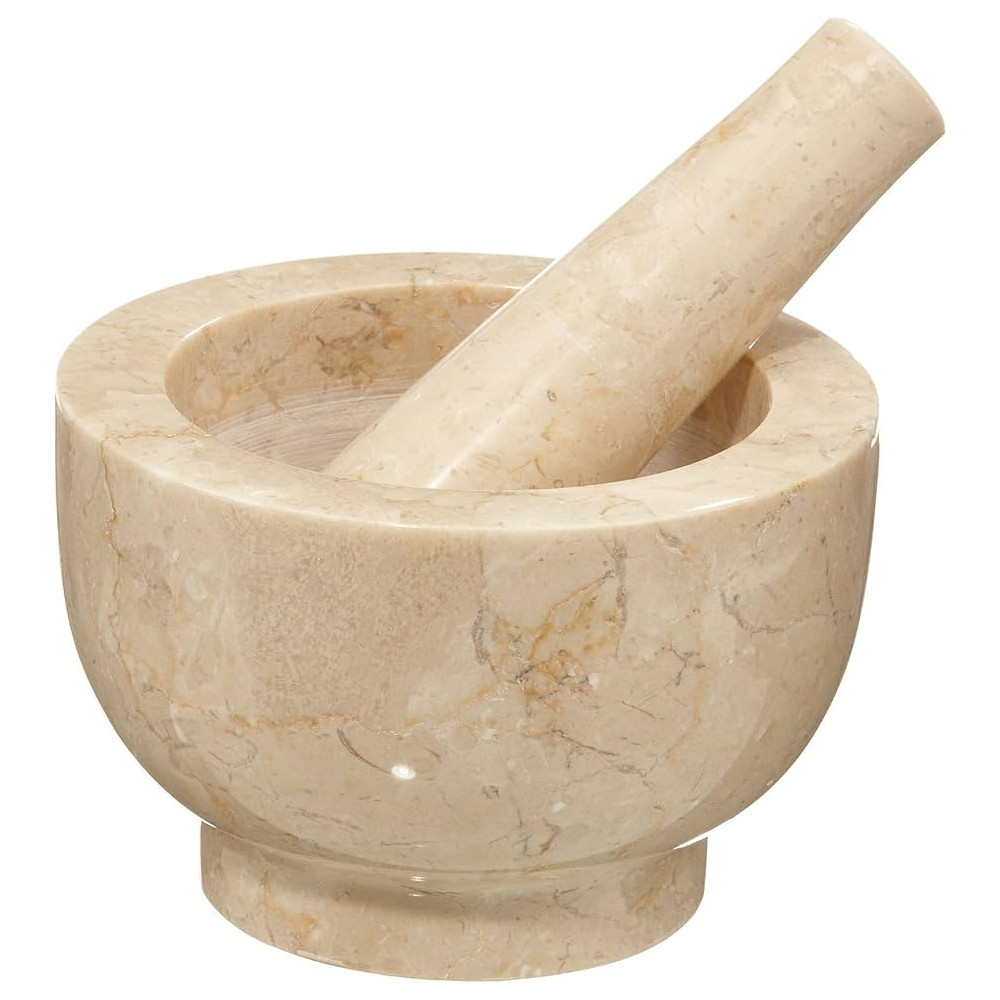 Meget smuk og funktionel morter i lys marmor i den helt rigtige str.